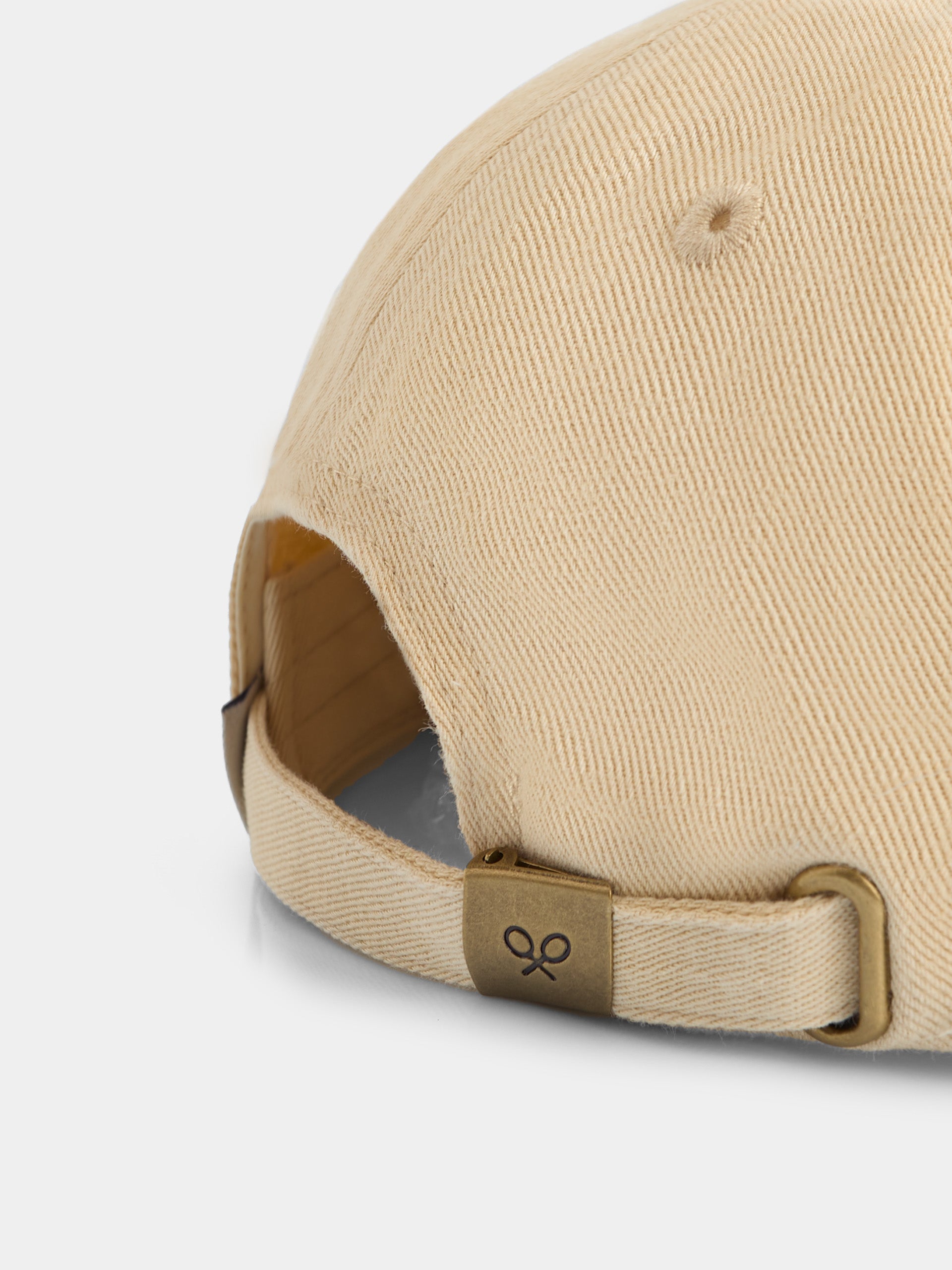 Beige embroidered racquet cap