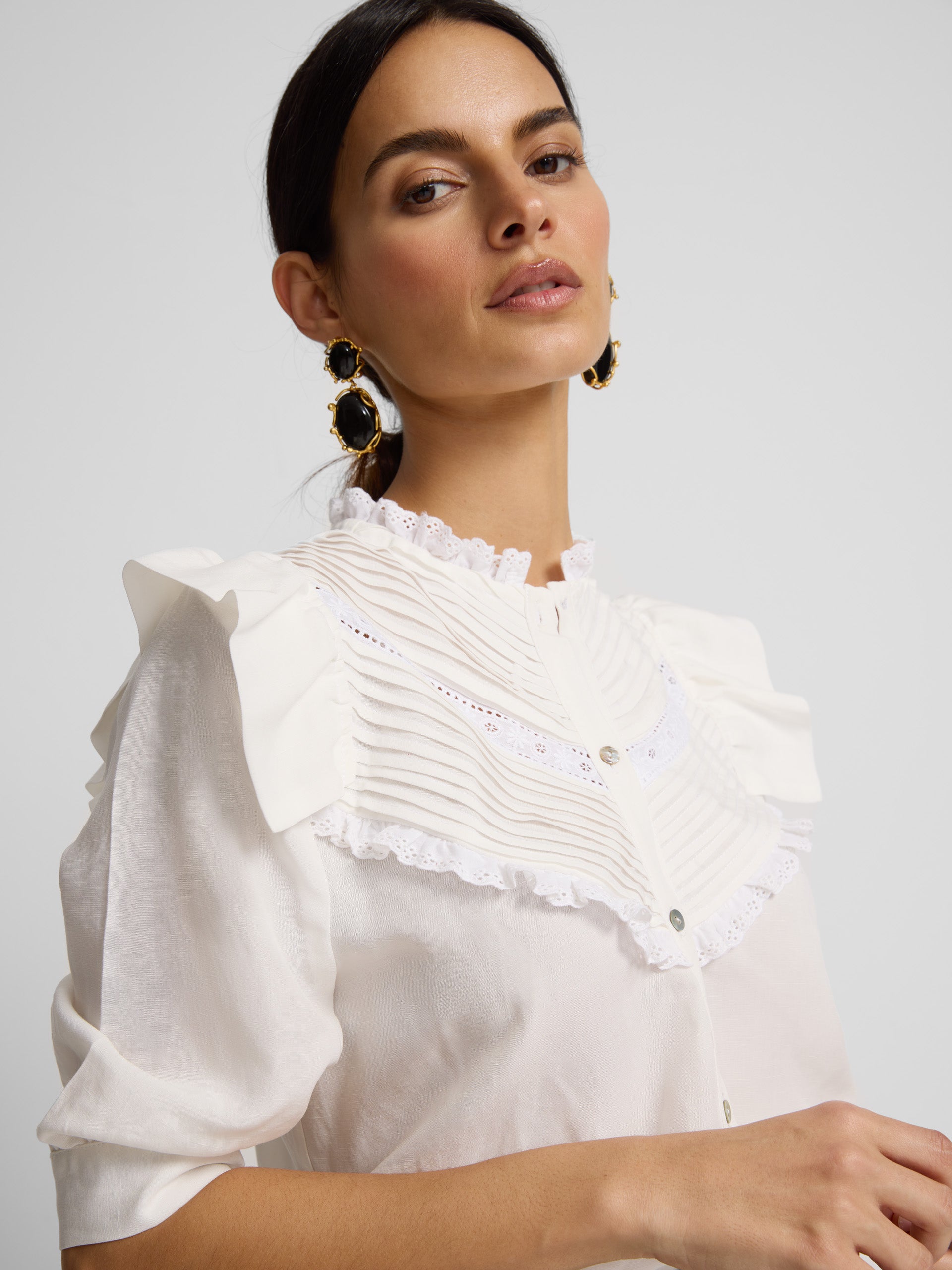 White ruffled neckline blouse