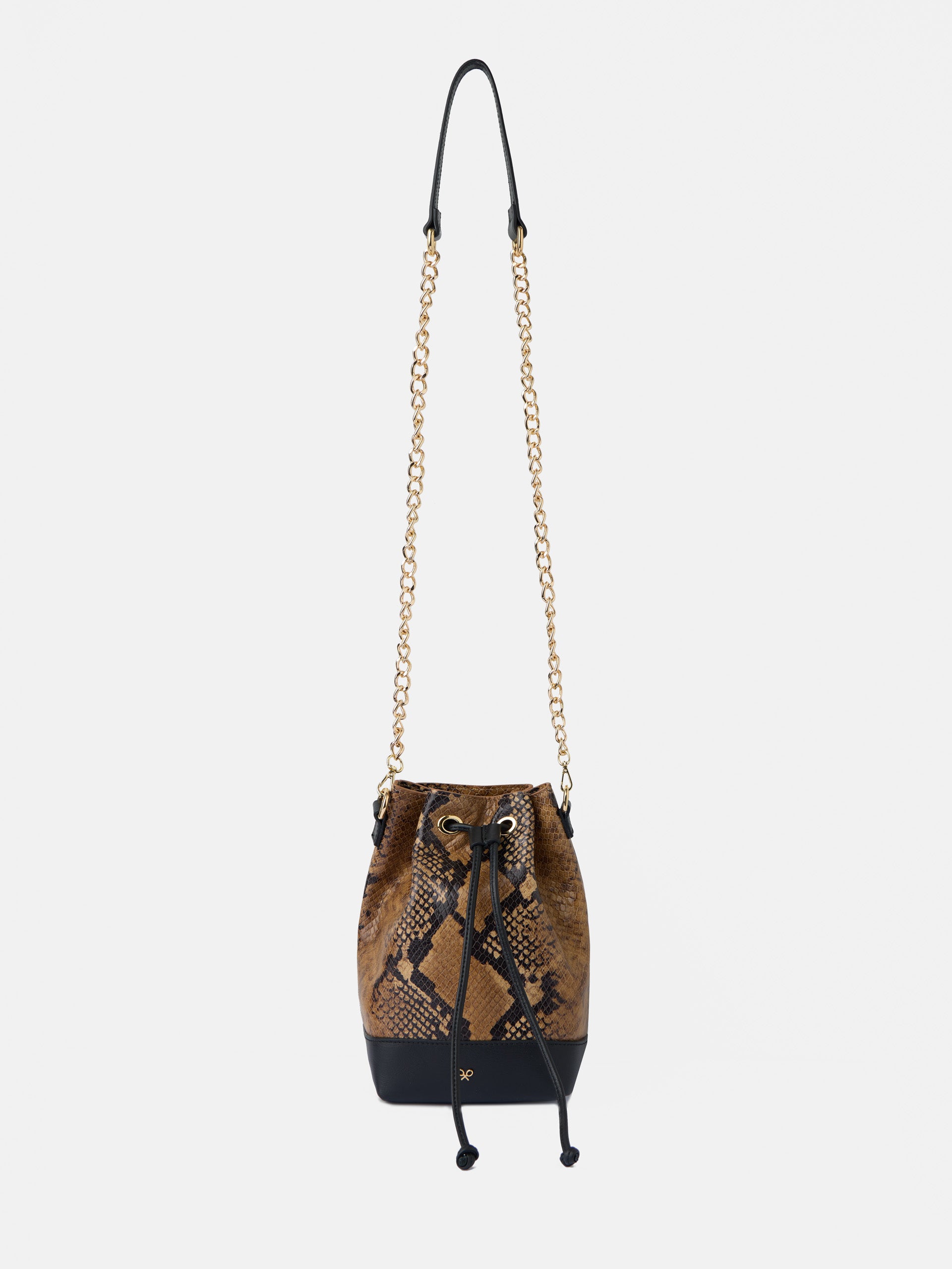 Brown animal print leather sack bag